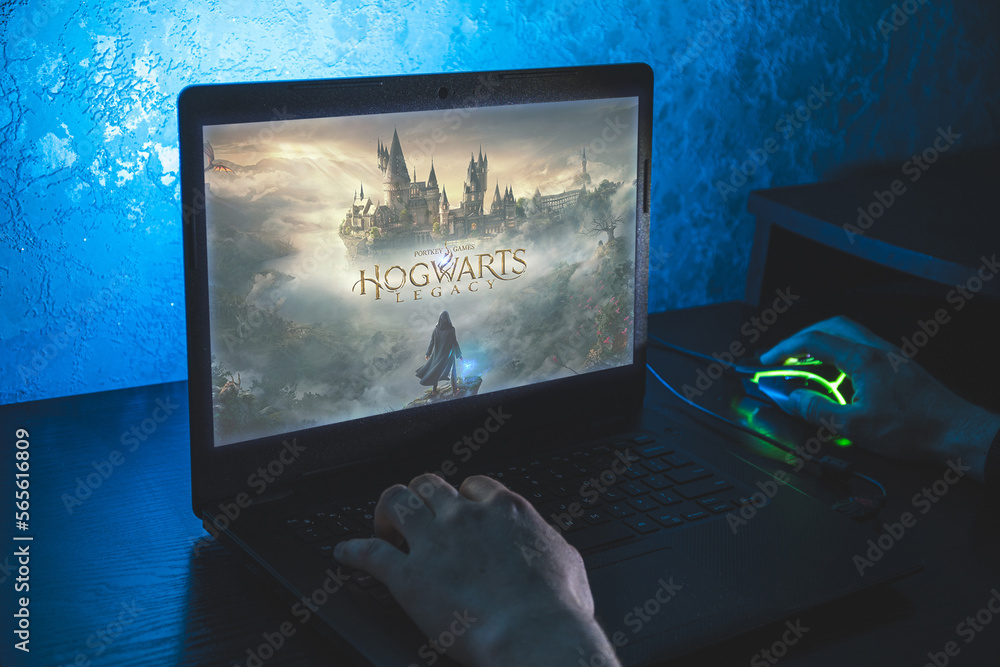 Hogwarts legacy new video game. Close up shoot of playing video game on ...