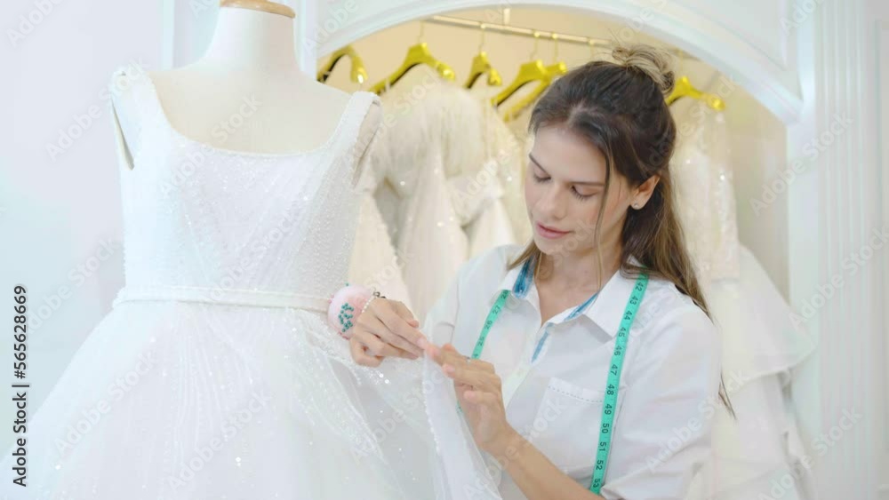 4K, Portrait of Smiling caucasian woman is bridal shop owner working ...