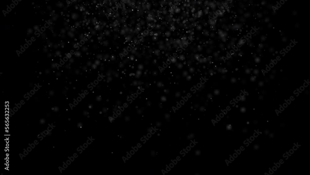 Abstract Loop of falling down white dust particles on black background ...