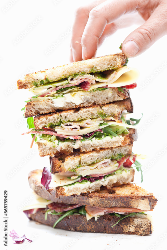 stack of sandwiches on white background Stock Photo | Adobe Stock