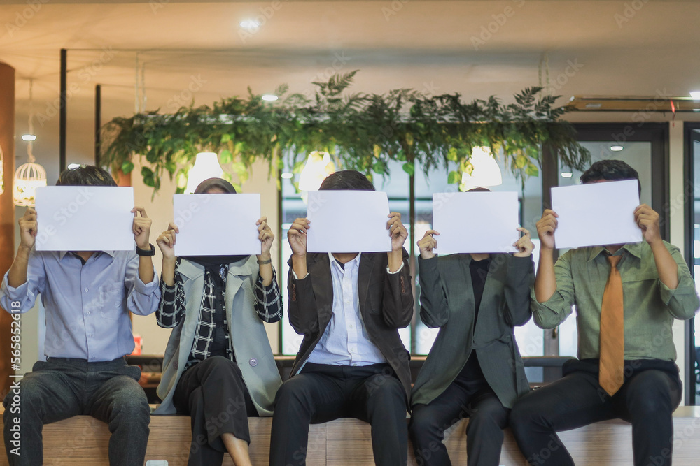 Group of unrecognizable young multiracial business people covering ...