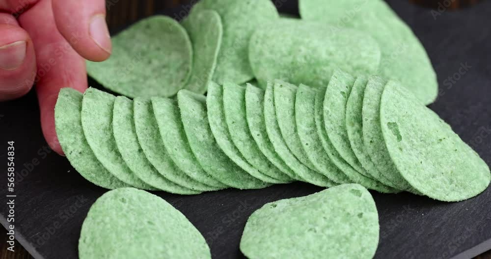 Take crispy potato chips of green color, unusual potato chips of green ...