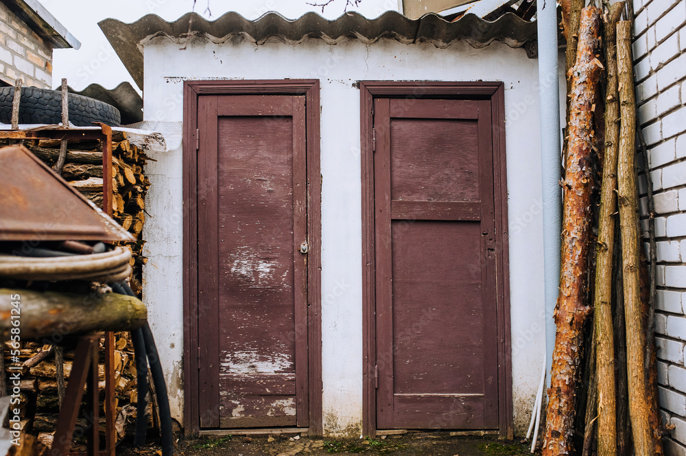 Rural, rustic dirty Russian abandoned toilet stands outdoors in Russia ...