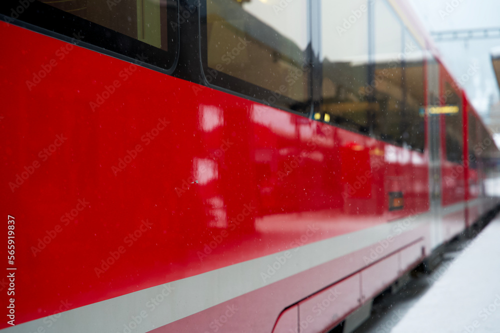 Red swiss train of the albula express railway in winter Stock Photo ...