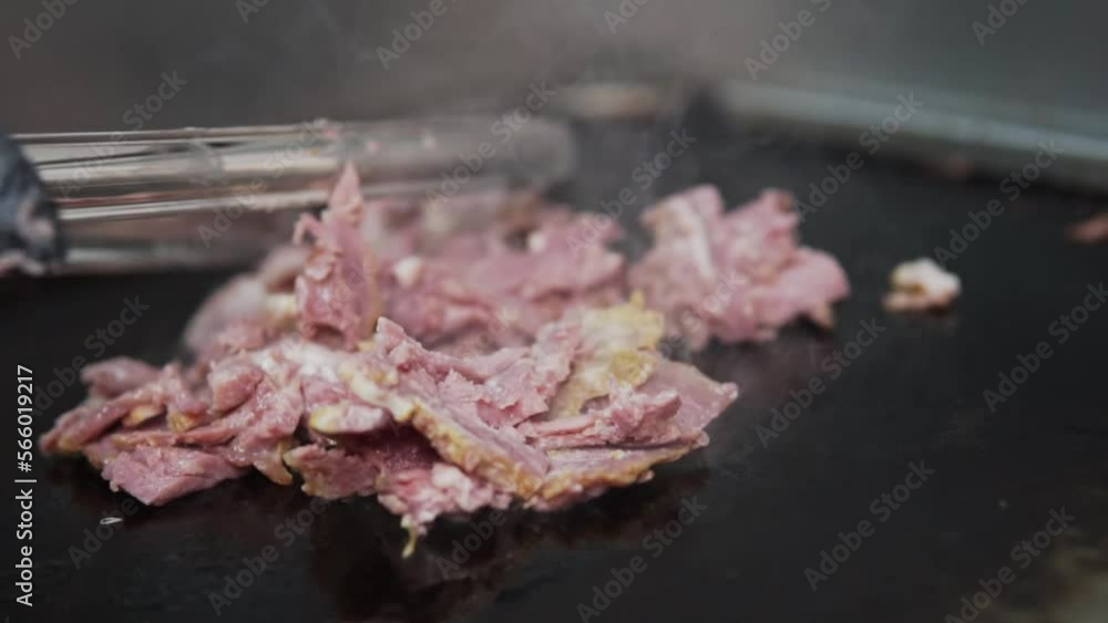 Smoked beef is turning red on the grill. Stock ビデオ | Adobe Stock
