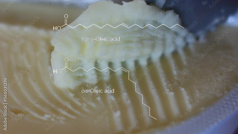 A knife spreading butter appear with a overlay of fatty acids and other ...