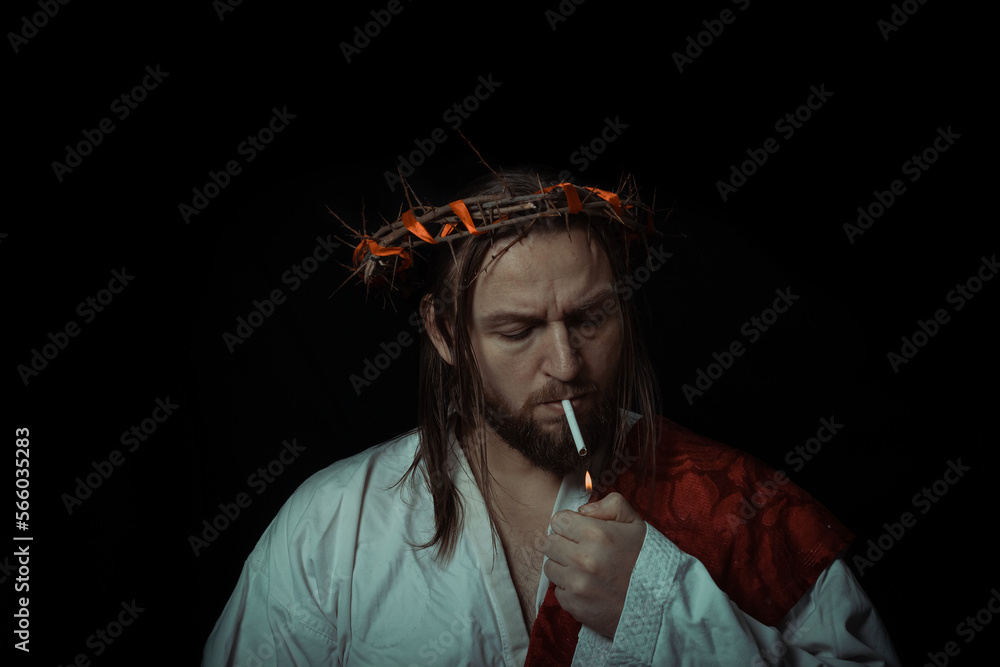 Jesus Christ smokes a cigarette wearing a crown of thorns and white ...