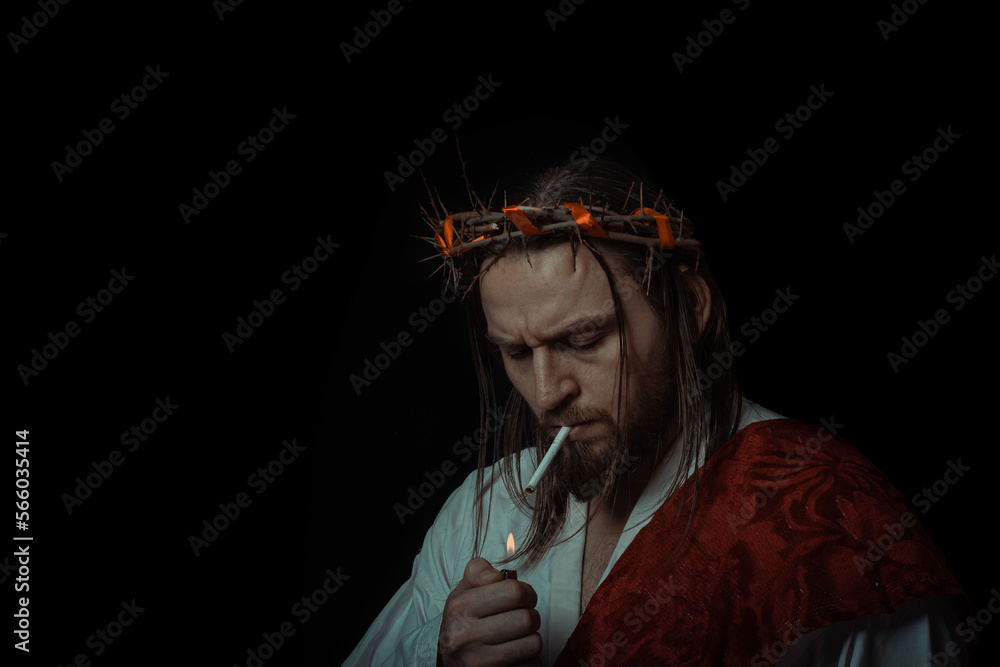 Jesus Christ smokes a cigarette wearing a crown of thorns and white ...