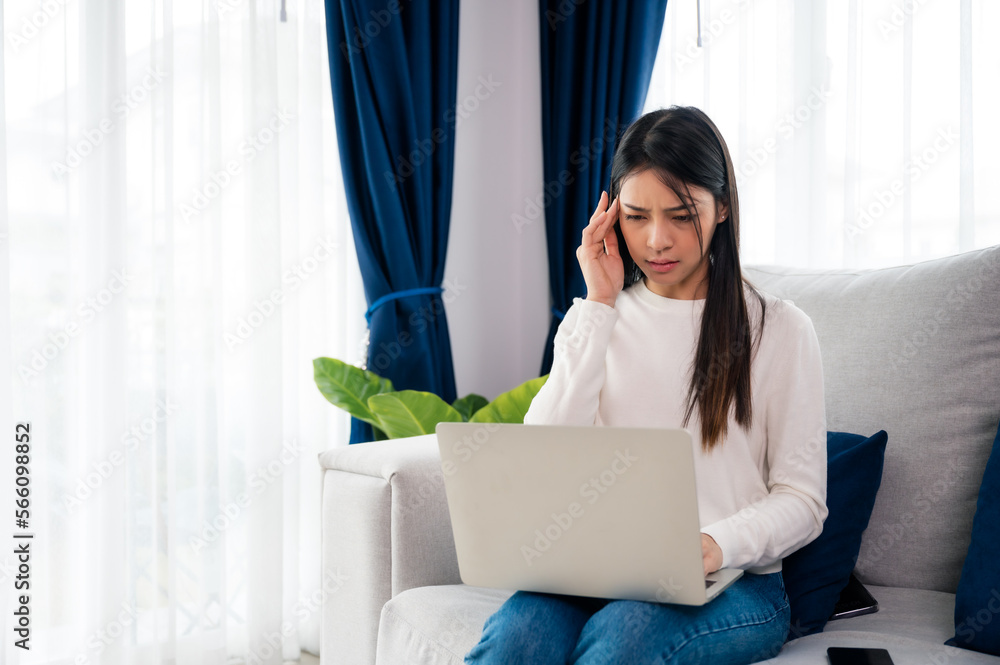 Office syndrome. Overworked tired young asian woman feeling headache ...