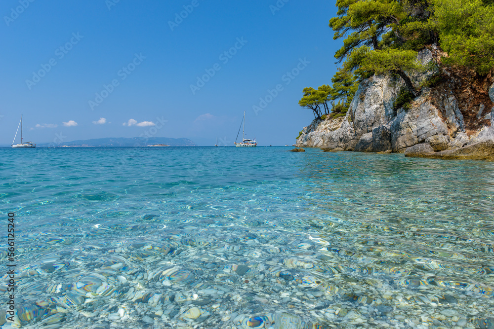 Poster The famous pebble beach kastani with the turquoise waters where ...