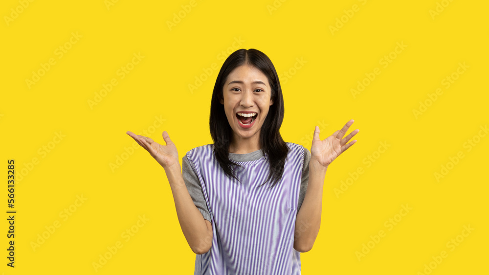 Asian woman acting shocked or surprised isolated on a white background ...