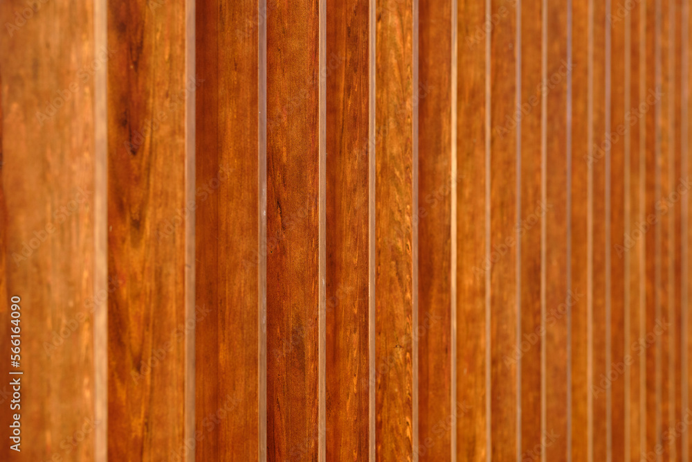 Abstract of exposed timber beams. Facade made up of vertical hardwood ...