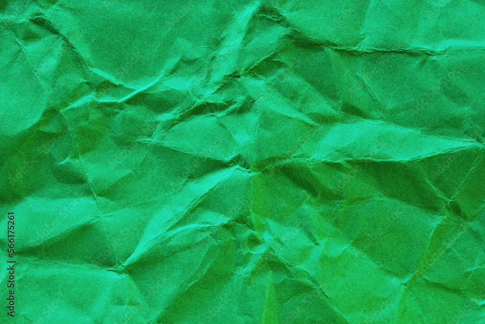 Green colored wrinkled paper texture, a sheet of recycled green paper ...