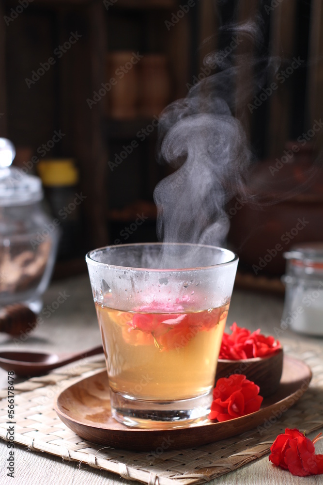Tea is an aromatic beverage prepared by pouring hot or boiling water ...