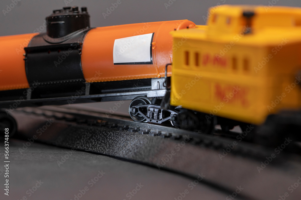 Toy railway tank derailed, close-up. Concept: train wreck, train crash ...