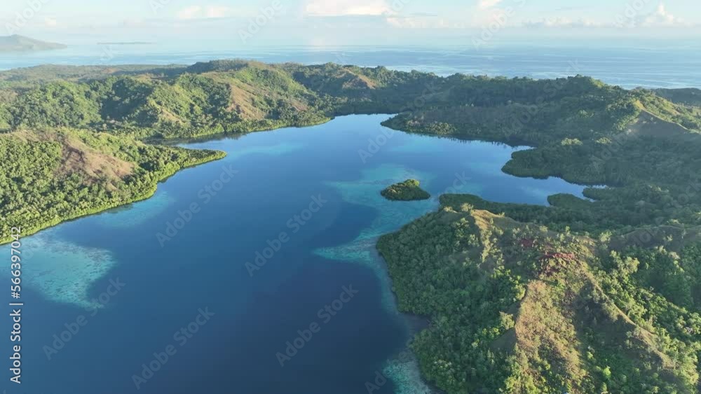 Sunrise shines light on tropical islands and coral reefs in the Solomon ...