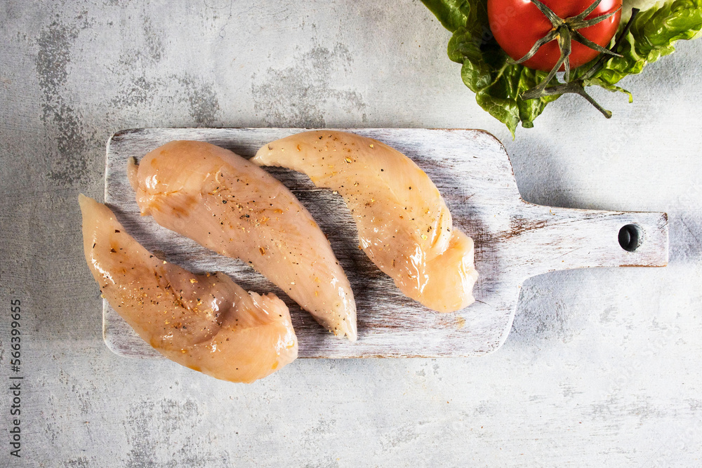 Raw chicken breast. Chicken breast fillets on a cutting board. Meat ...