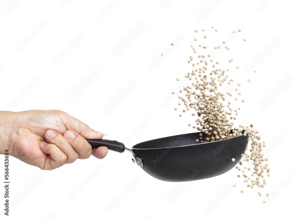 White Pepper seeds fall down pour in steel pan, white Pepper float ...