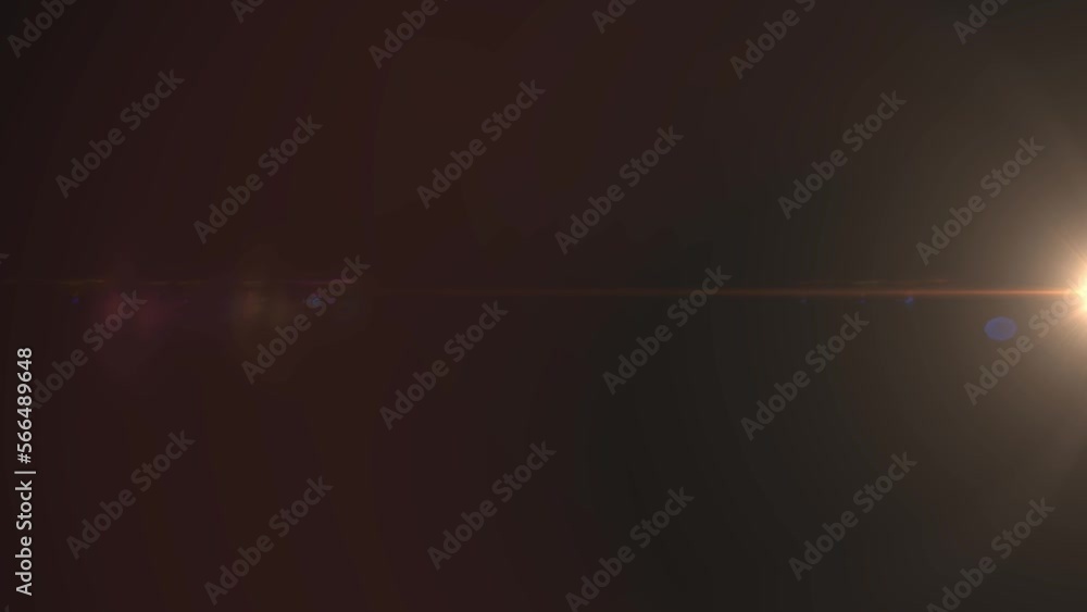 Optical Lens flare effect, 4K yellow on black background. Top left ...