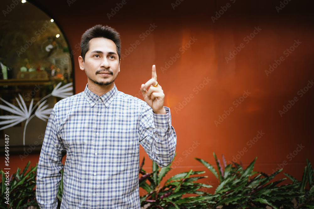 Young Muslim Raising the index finger for Tauhid symbol in islam on ...