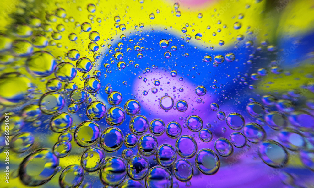 Colorful yellow blue abstract background, bubbles in transparent liquid ...