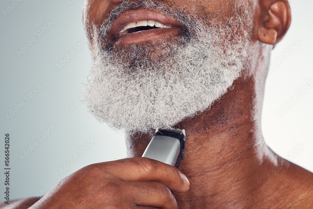 Grooming, skincare and man shaving beard on face isolated on a grey ...