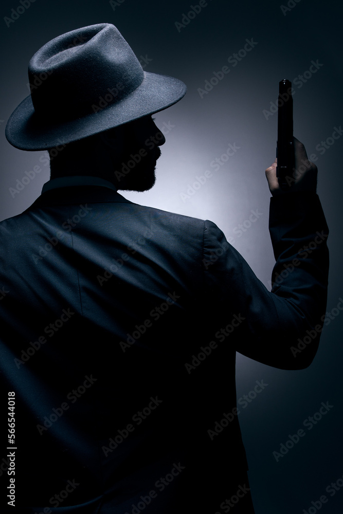 Gangster, silhouette or holding gun on studio background in secret spy ...
