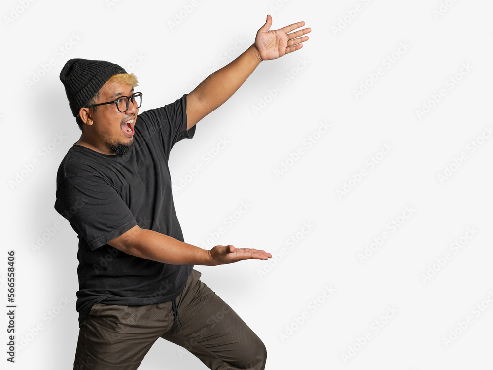 Asian man set pointing his two hand in right direction. A casual people ...