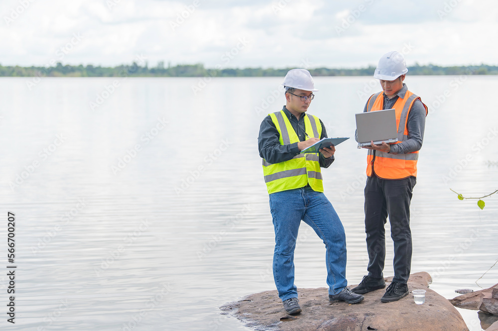 Environmental engineers inspect water quality,Bring water to the lab ...