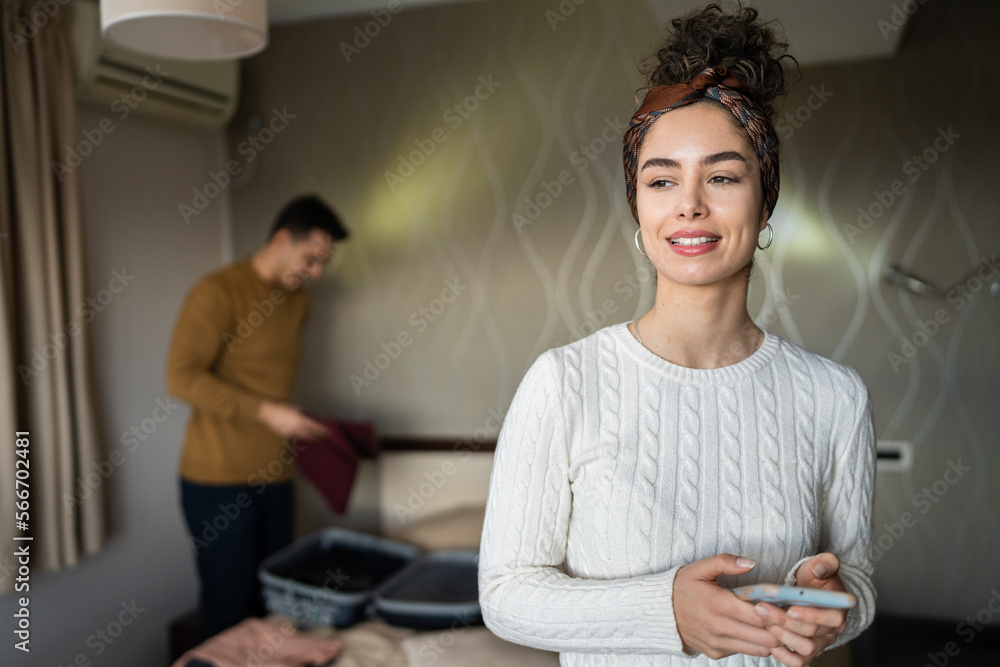 couple young beautiful woman and man in hotel room wife or girlfriend ...