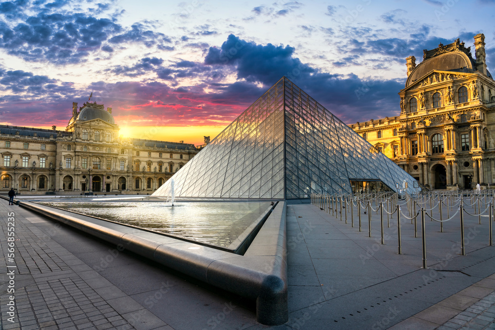 Paris Louvre Museum at sunrise. Home to Leonardo da Vinci's Mona Lisa ...