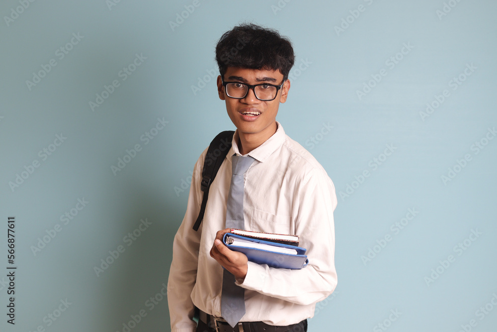 Indonesian senior high school student wearing white shirt uniform with ...