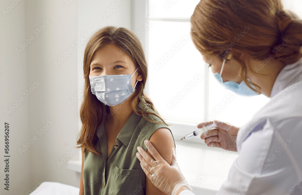 Happy child getting vaccinated against infection. Portrait of cheerful ...