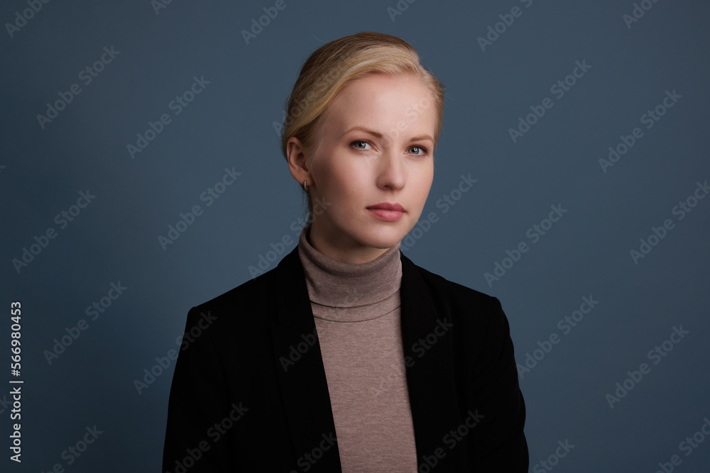 Business woman headshot in studio. A beautiful girl with a beaming ...