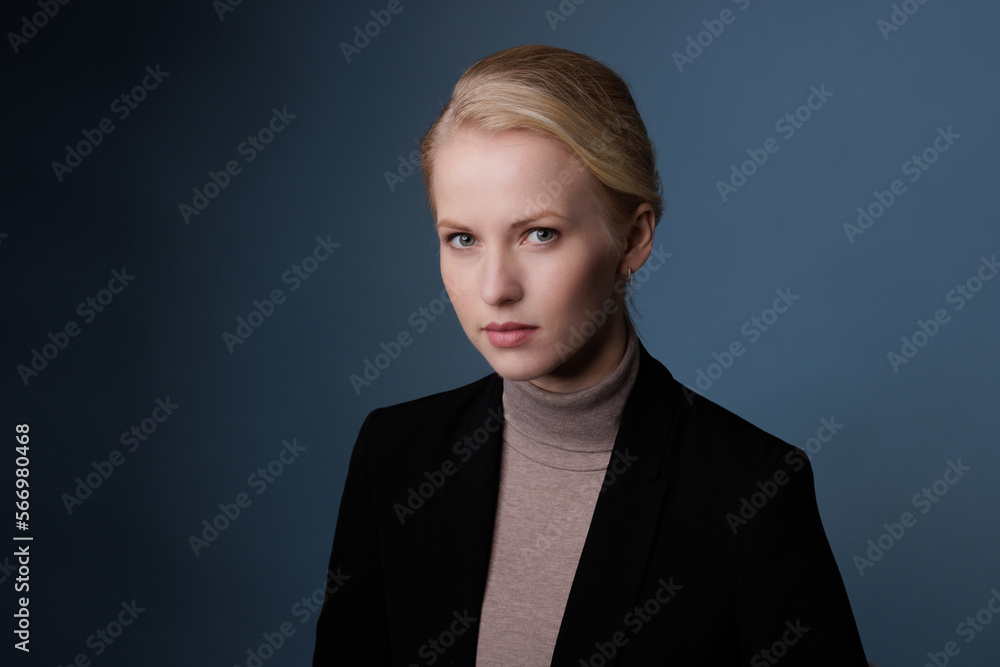 Business woman headshot in studio. A beautiful girl with a beaming ...