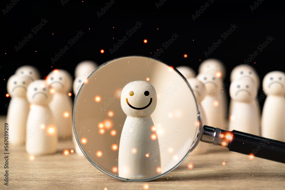 Happy wooden figure stands out from the crowd,Wood figure with happy ...