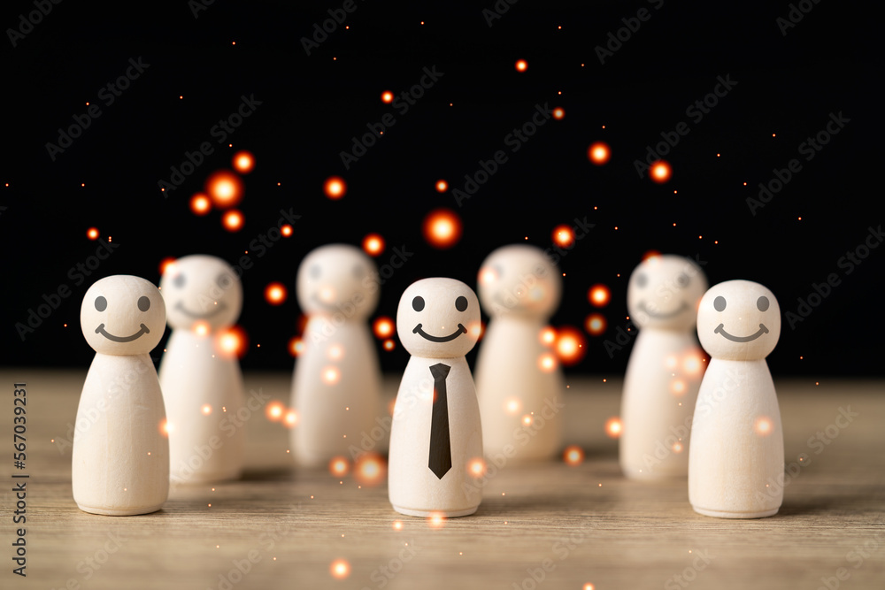 Happy wooden figure stands out from the crowd,Wood figure with happy ...