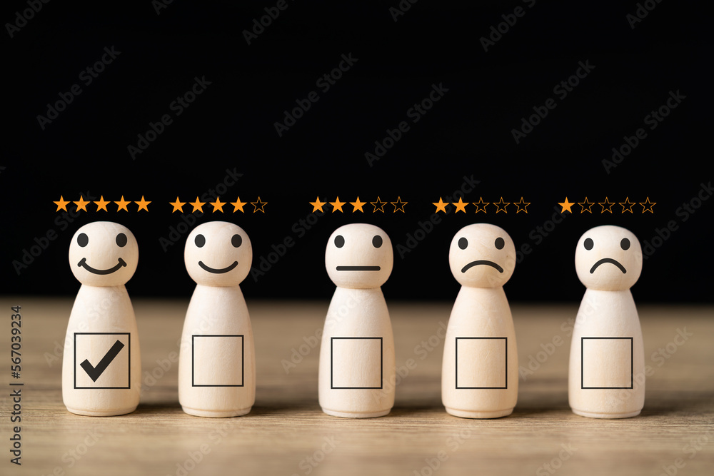 Happy wooden figure stands out from the crowd,Wood figure with happy ...