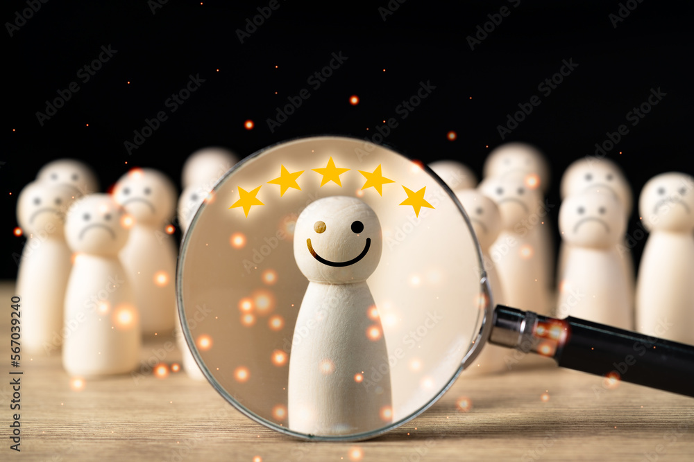 Happy wooden figure stands out from the crowd,Wood figure with happy ...