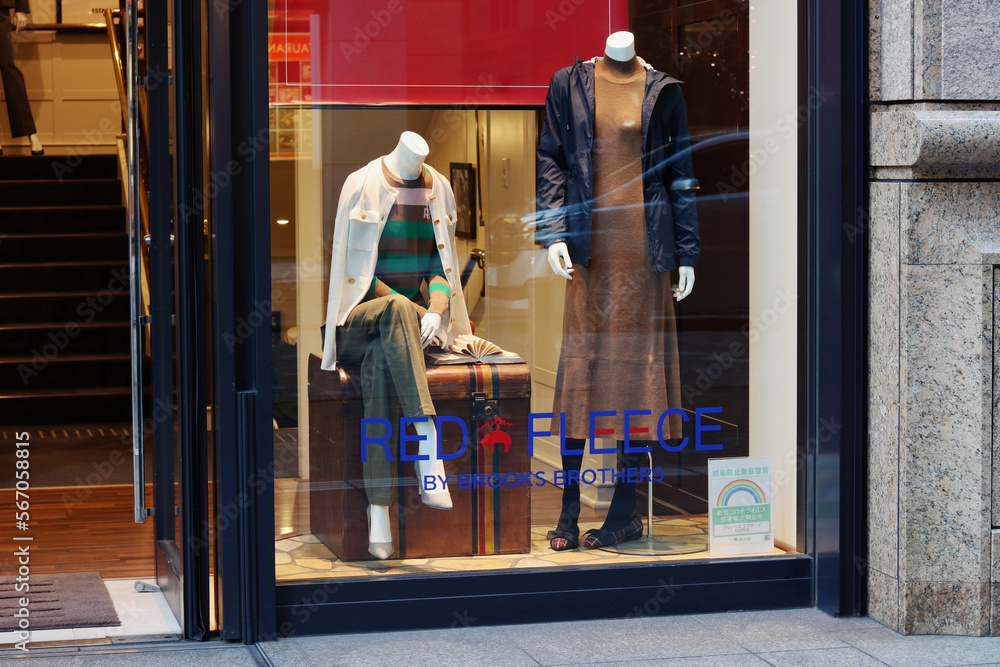 TOKYO, JAPAN - February 4, 2021: Mannequins in the window of a Brooks ...
