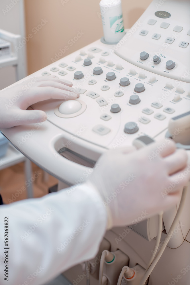 Probe for ultrasound diagnostics close-up. The doctor holds in his ...