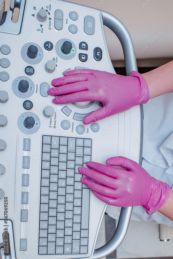 Probe for ultrasound diagnostics close-up. The doctor holds in his ...