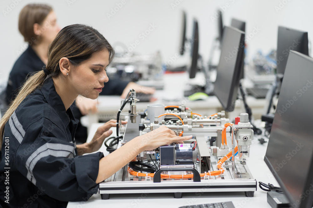Team female engineer training Programmable logic controller with AI ...
