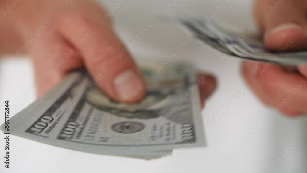 Counting American 100 dollar banknotes. Businesswoman counts the bills ...