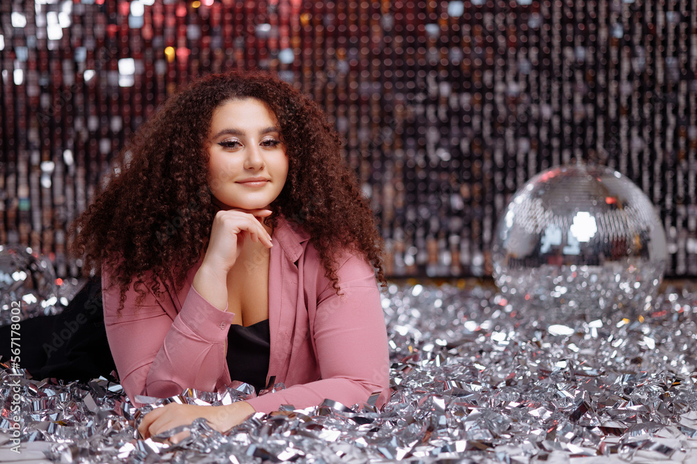 Beautiful, confident woman plus size model in a pink cape and black ...