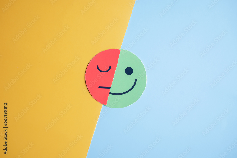 Happy smiley face hiding or behind sad face, change emotion bipolar and ...