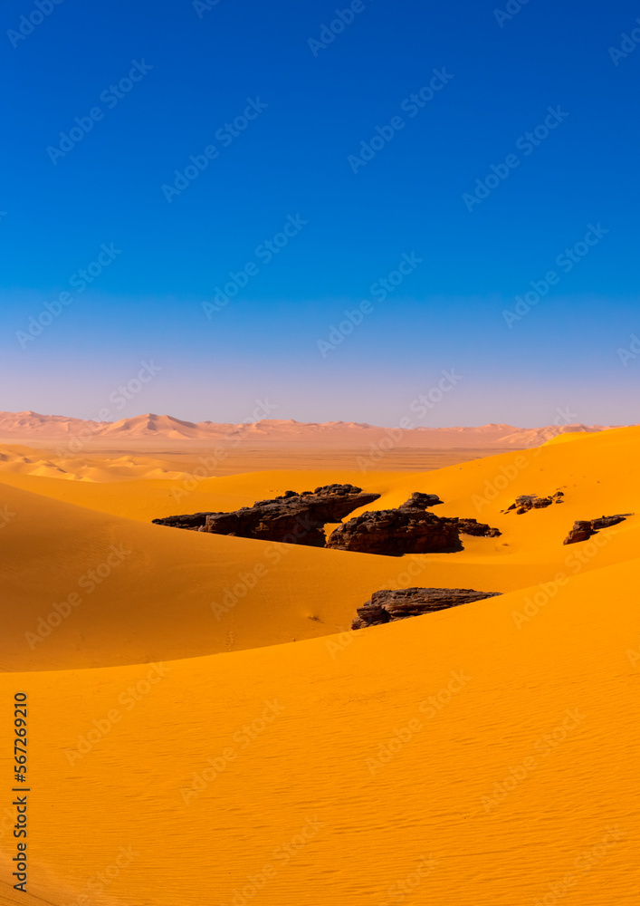Rocks and sand dunes in Sahara desert, North Africa, Erg Admer, Algeria ...