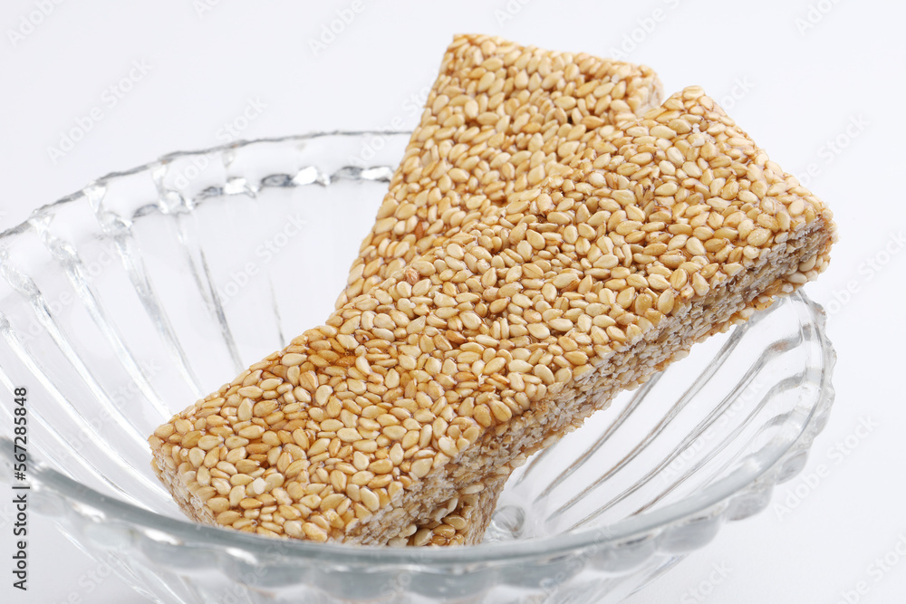 Til chikki and sesame seed with jaggery sweet bar Indian sweet dish ...