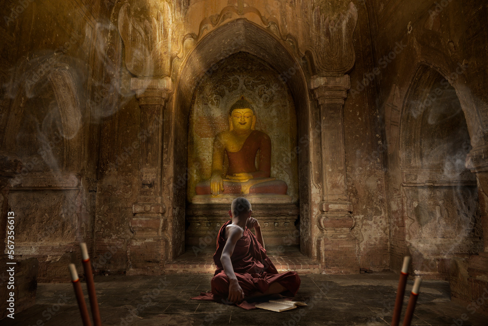 Novice buddhist monk inside a temple in the Bagan Valley Stock Photo ...