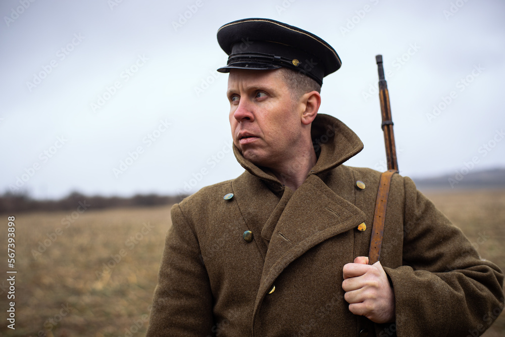 nice emotional old retro ussr world war 1 soldier standing armed in the ...